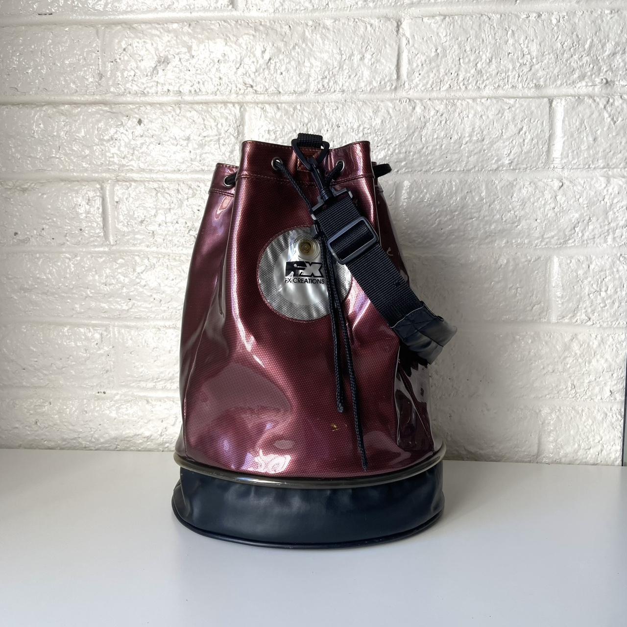 Sporty maroon and black large bucket bag with top... - Depop