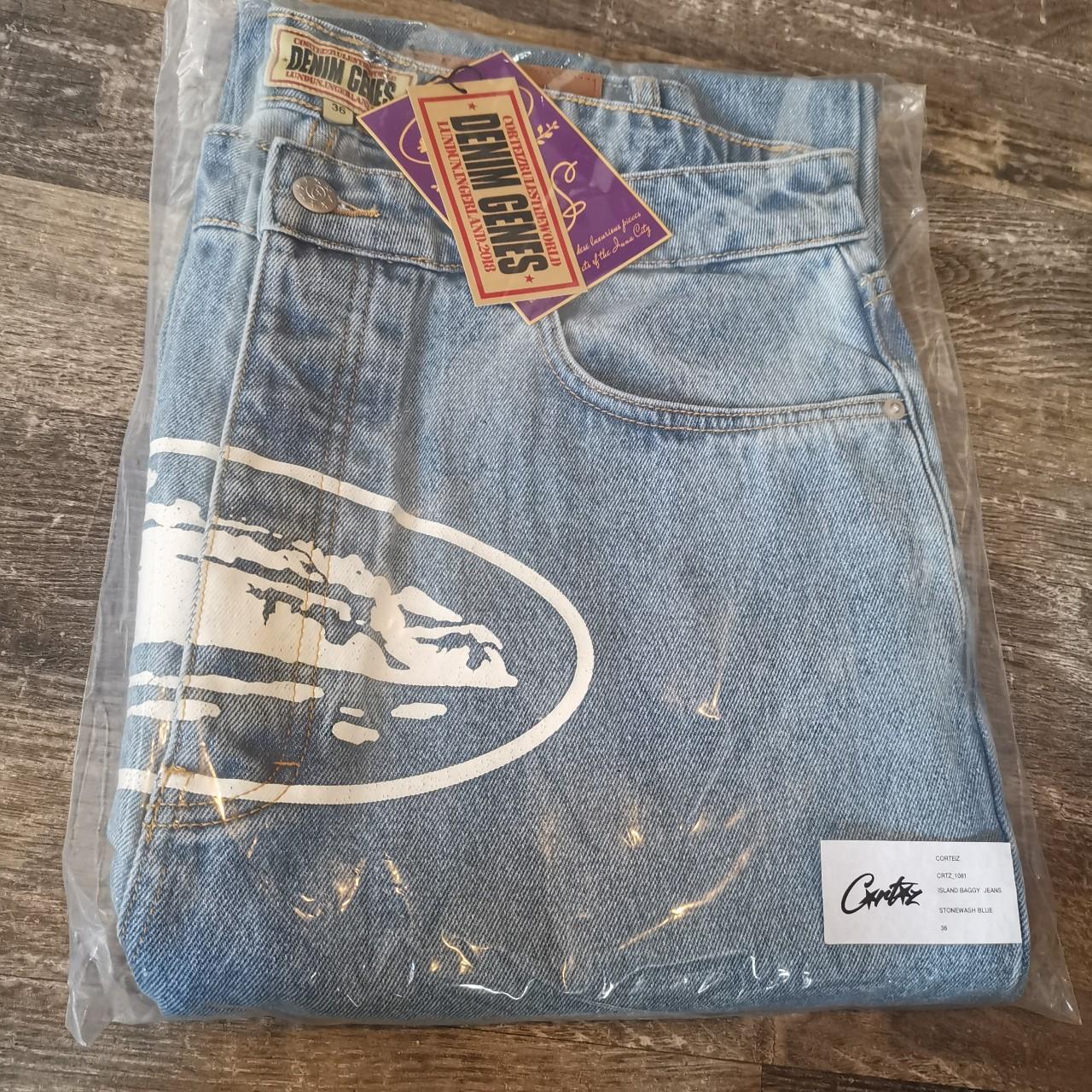 Corteiz island baggy jeans stonewash blue - Depop