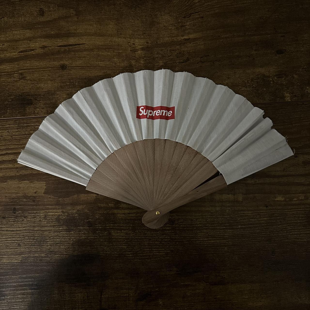 Supreme hand fan. Some wear at the edges of the fan... - Depop