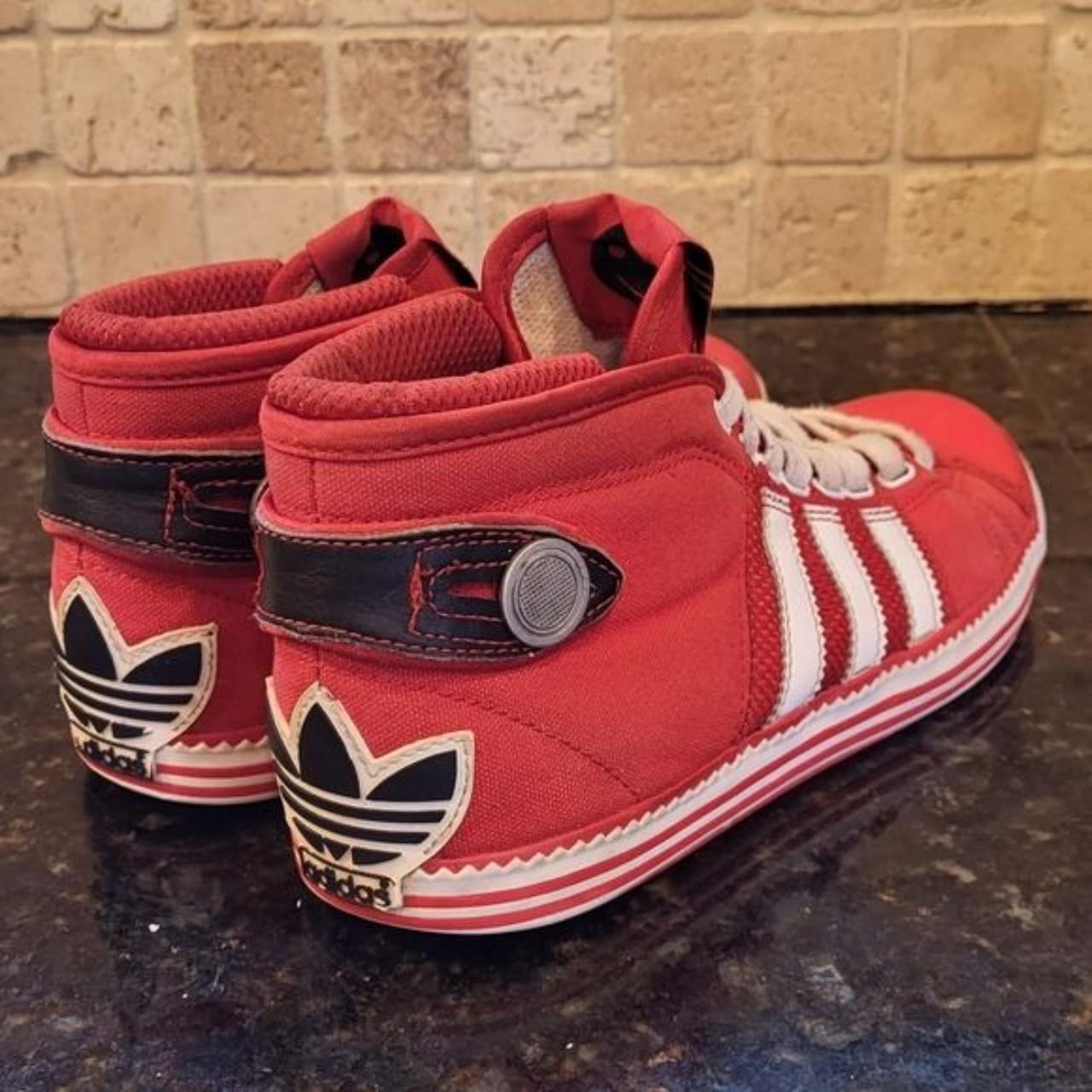 Fun vibrant pair of women's red and white Adidas... - Depop
