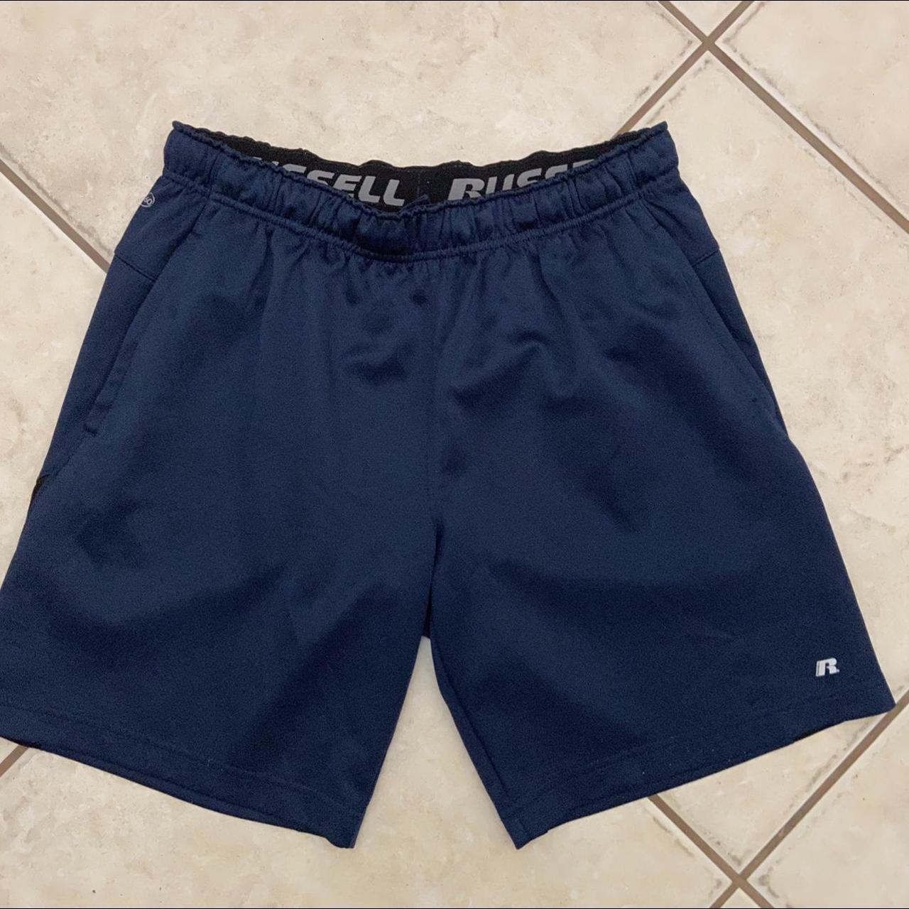 this is a pair of mens russell athletic blue... - Depop