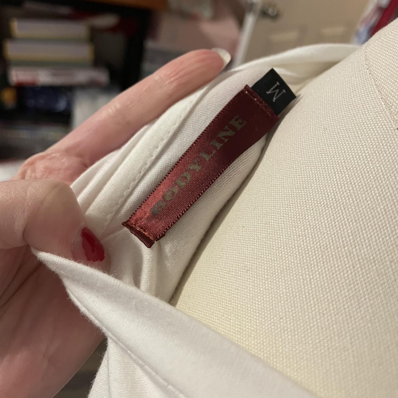 Bodyline cutsew top with sheer sleeves and heart cut... - Depop