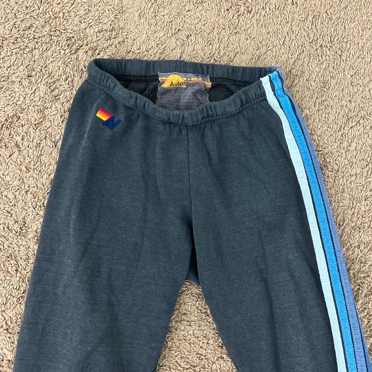 Aviator nation charcoal joggers with blue stripe... - Depop