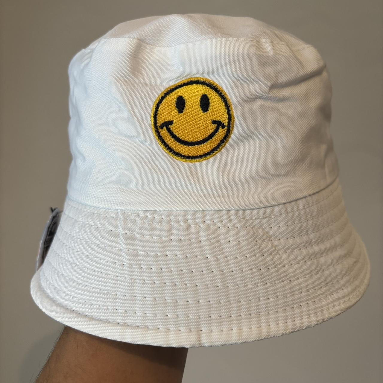 Brand new smiley face bucket hat Yellow... | Depop