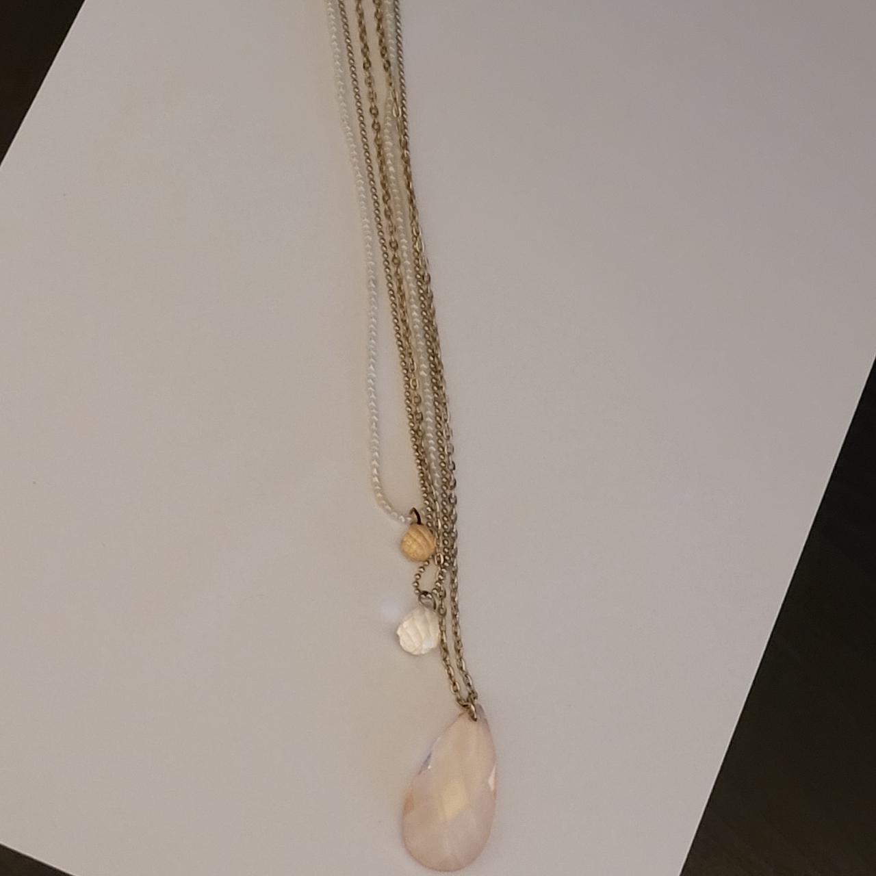 Extremely beautiful three stranded necklace Used -... - Depop