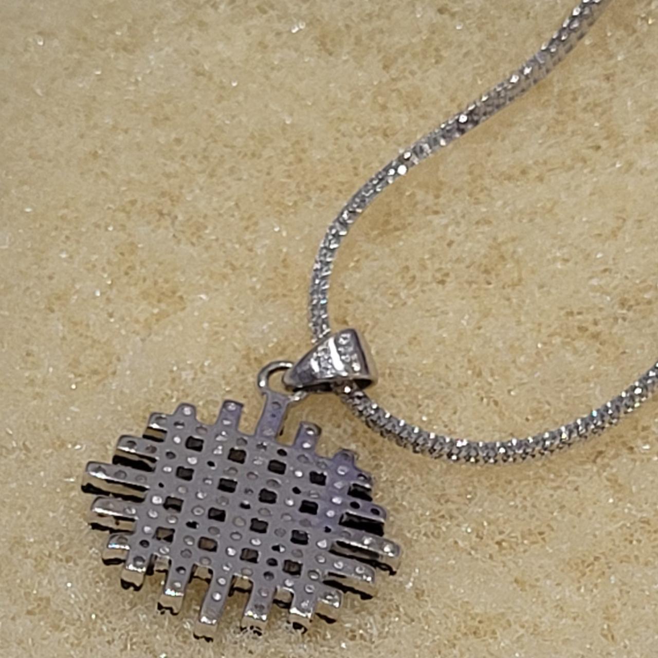 Elegant silver 925 blue diamond cross-hatch pendant... | Depop