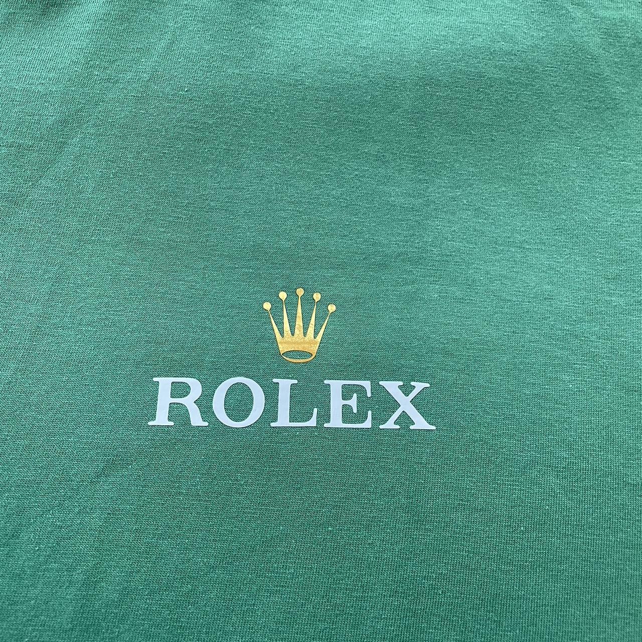 Rolex Men's Green and White T-shirt | Depop