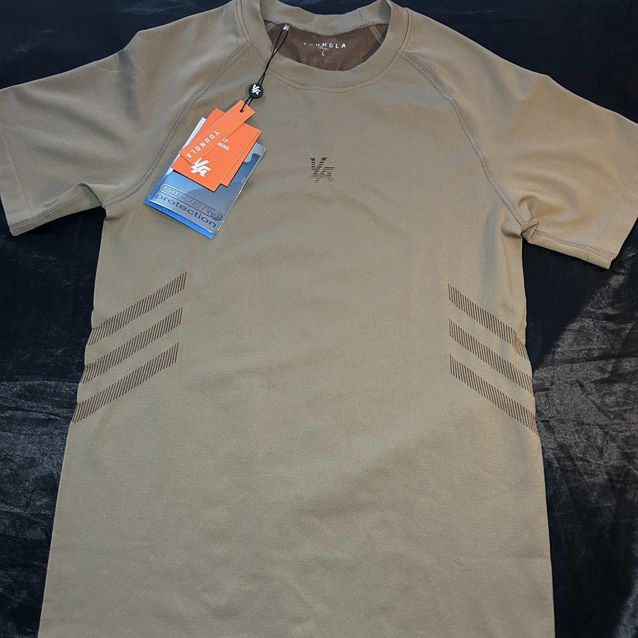 YOUNGLA brand new bleached sand compression tee-size... - Depop