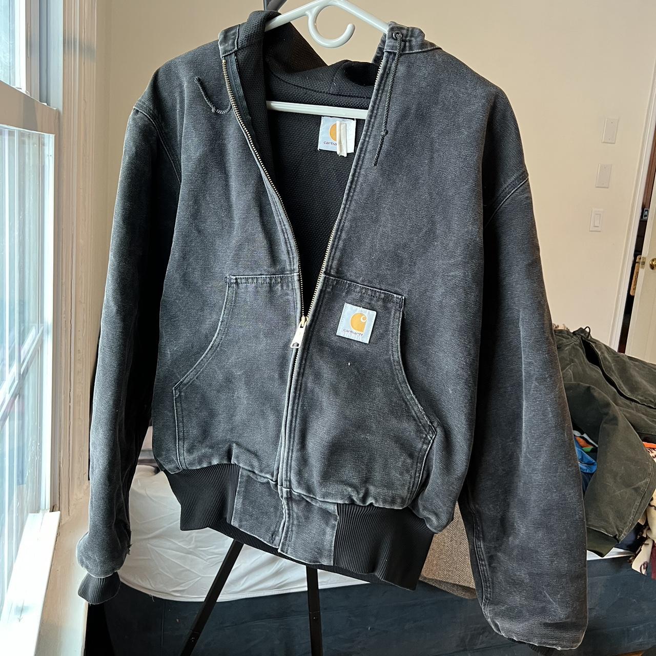 Black/gray hooded carhartt jacket Originally black... - Depop