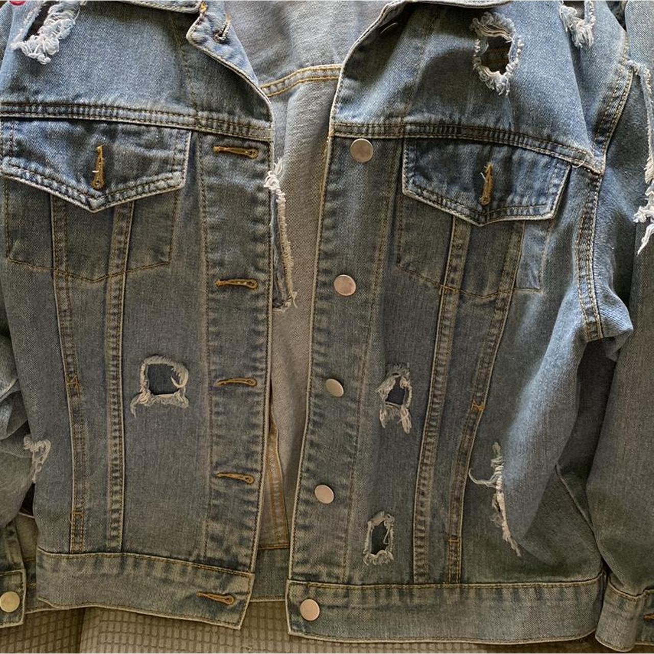 Ripped Jean jacket, fits like a L-Xl. Hamsa sequin... - Depop