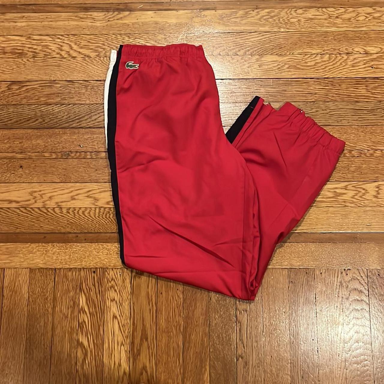 Lacoste sport track pants - Depop