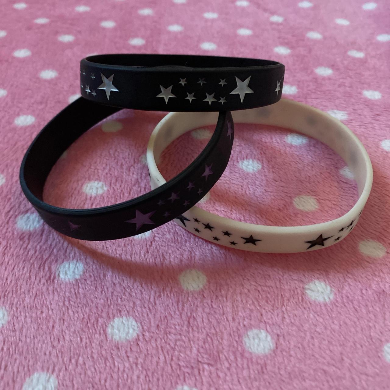 black, white, and purple silicone star... | Depop