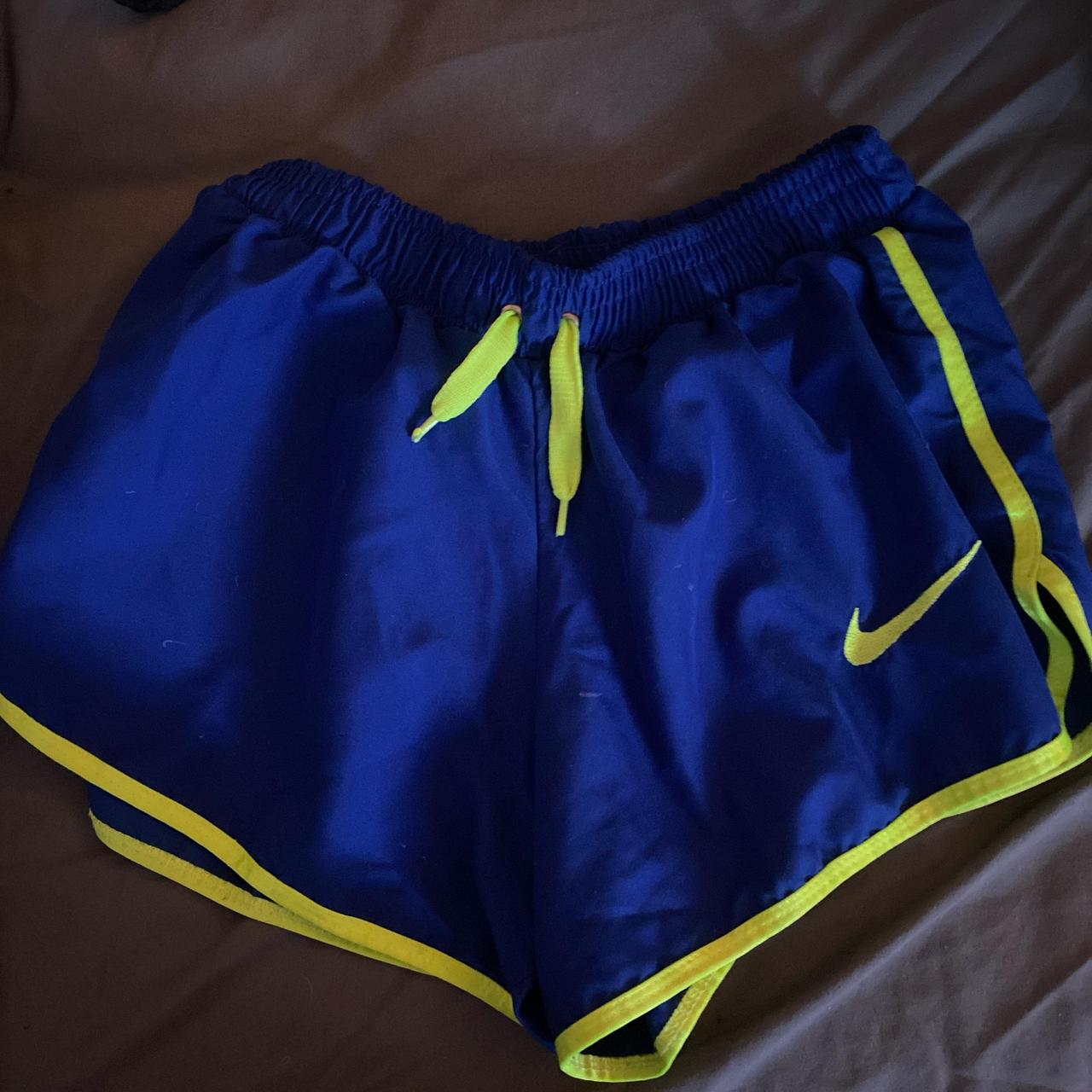 Nike blue and yellow running shorts | Depop