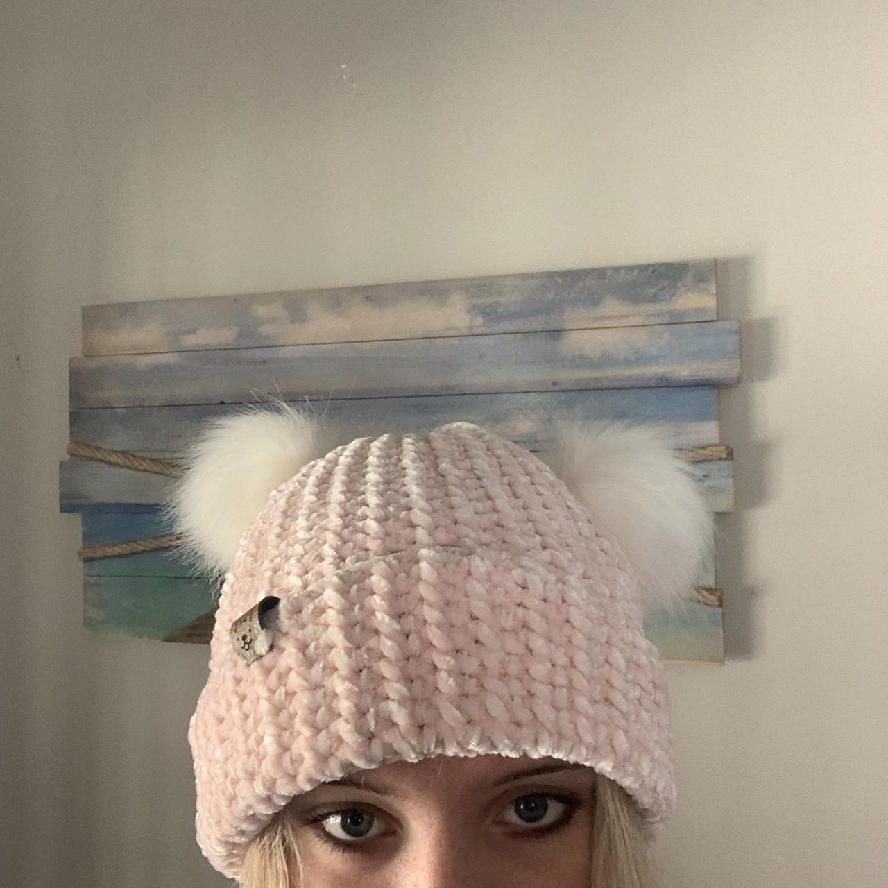 Cozy pink and white puff ball beanie with two pom... - Depop