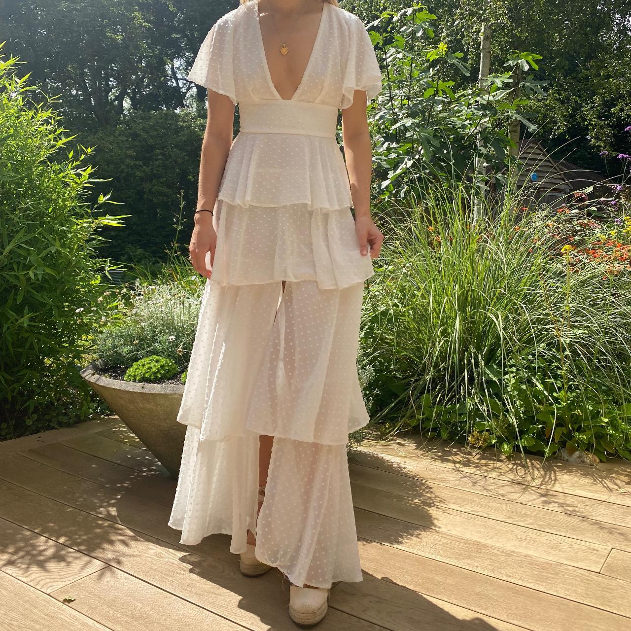 Stunning white tiered maxi dress with ruffled, v... - Depop