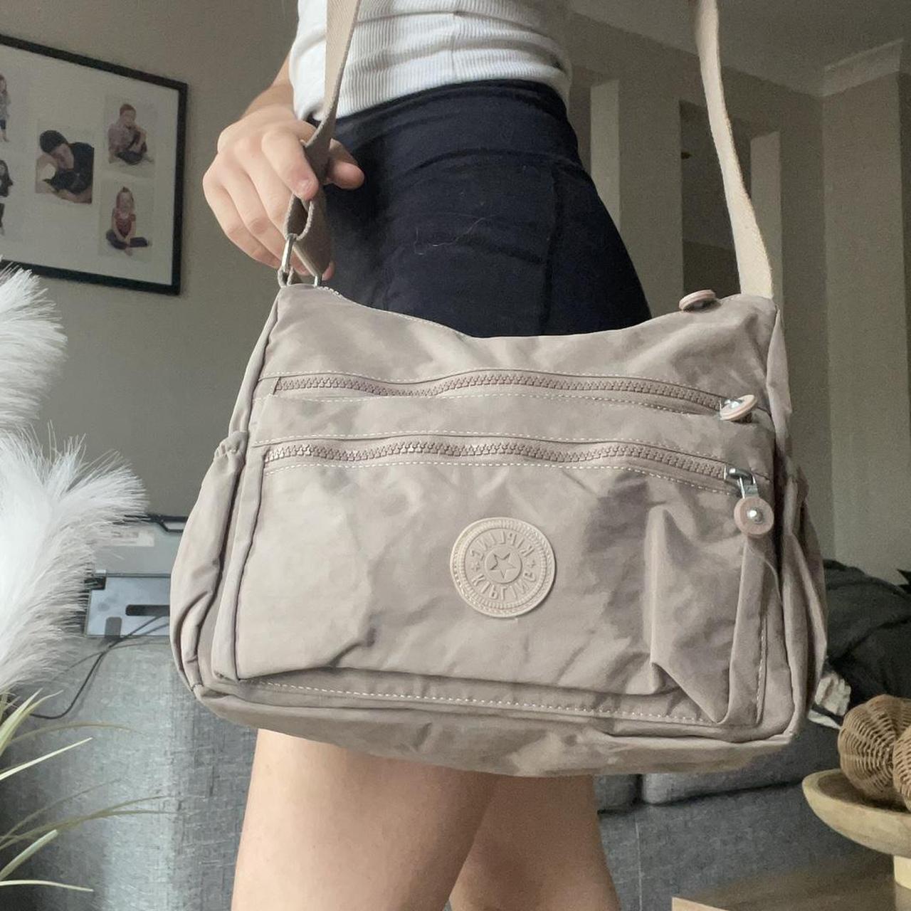 Tan and cream Kipling crossbody bag #crossbodybag - Depop
