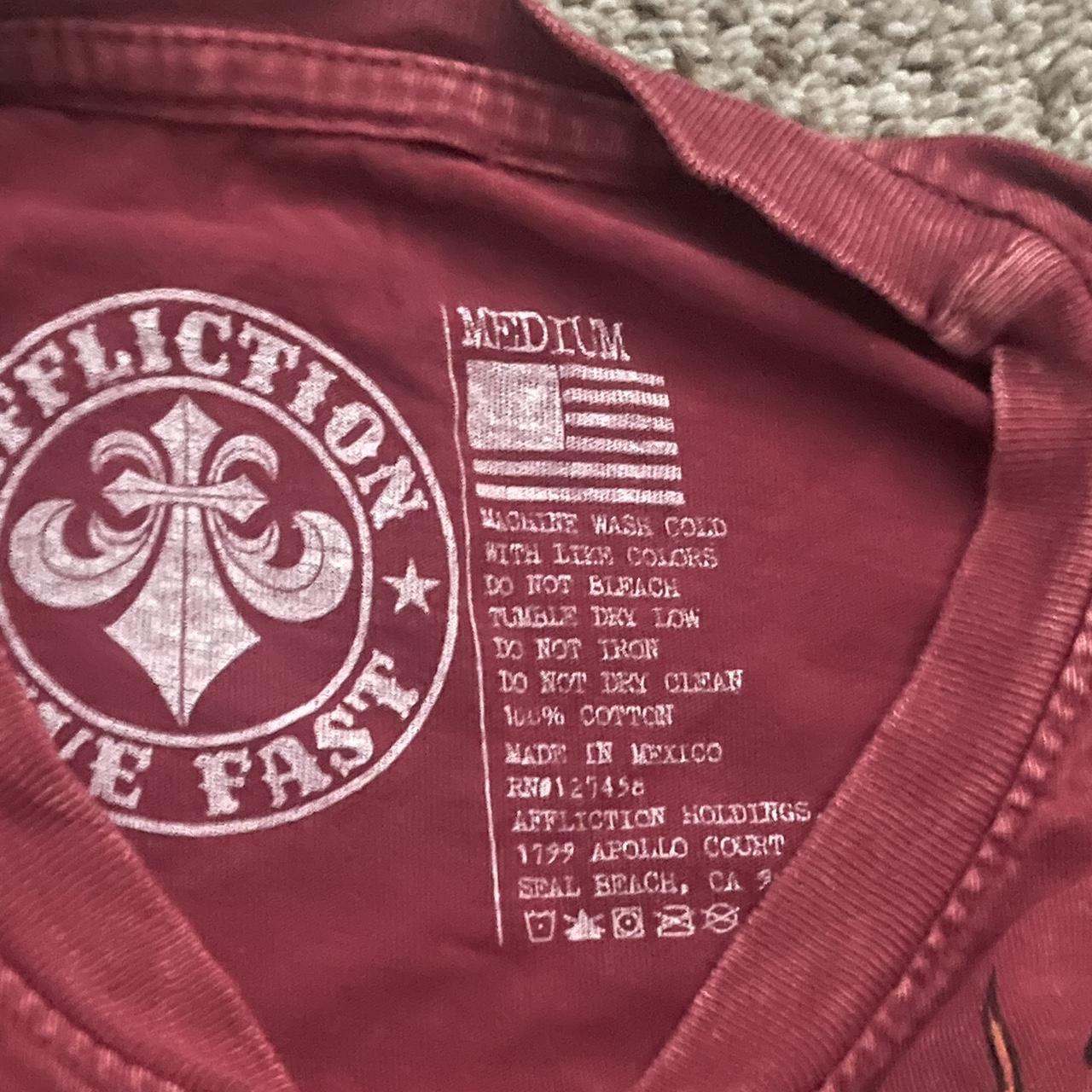 hella fire flaming skulls affliction shirt pit to... - Depop