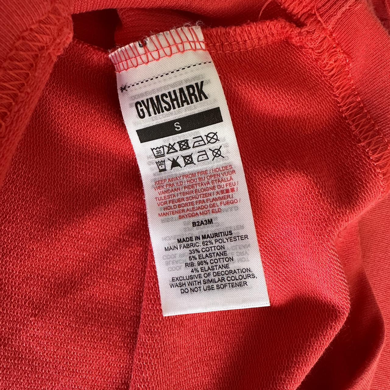 Gymshark training cropped hoodie Color is ruby red,... - Depop