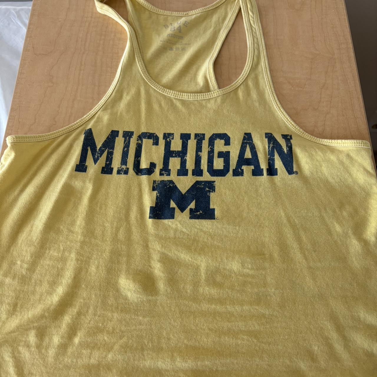 Pastel yellow Michigan tank. Women’s size medium but... - Depop