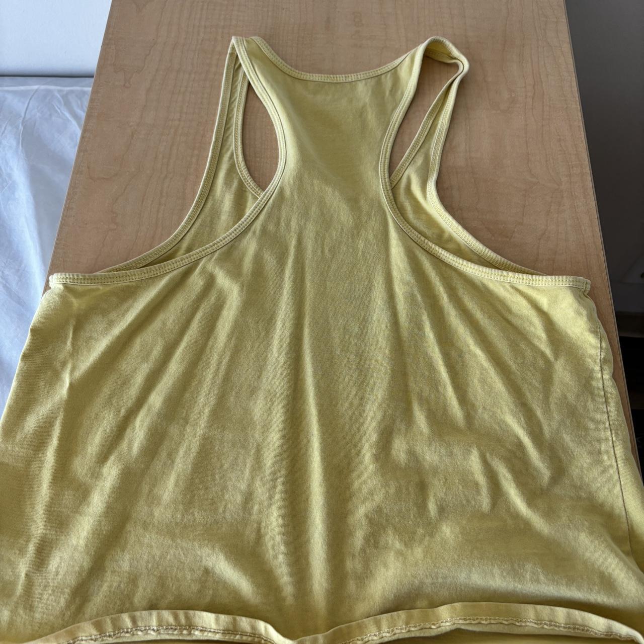 Pastel yellow Michigan tank. Women’s size medium but... - Depop