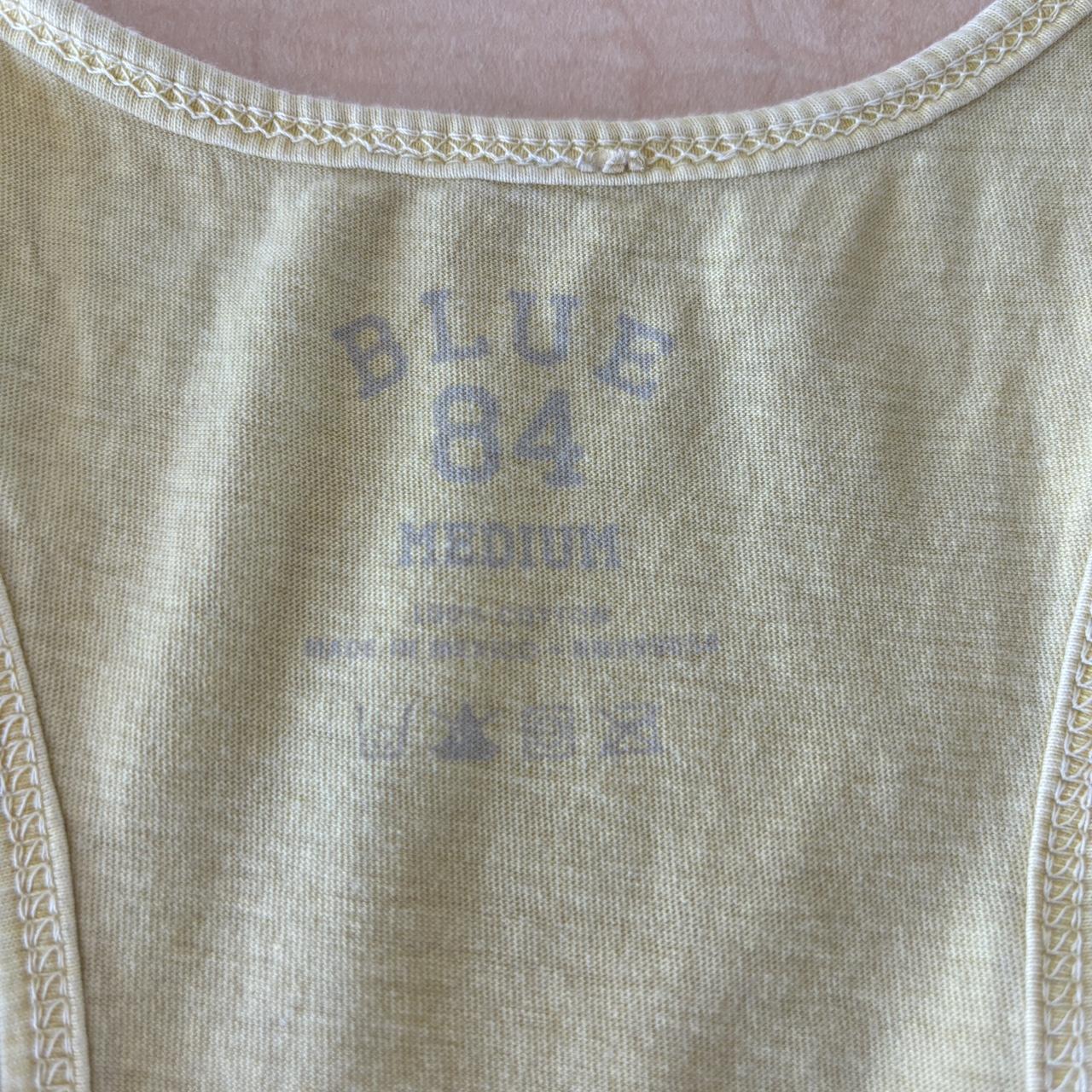 Pastel yellow Michigan tank. Women’s size medium but... - Depop