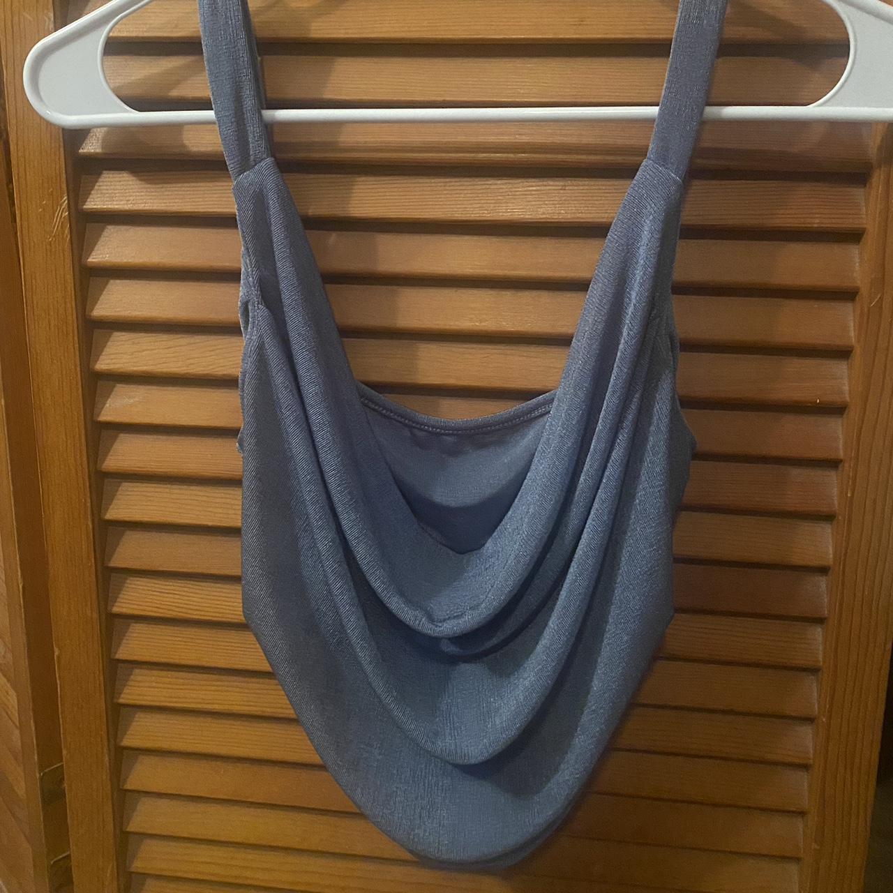 small cropped grayish/blue swoop top never worn - Depop