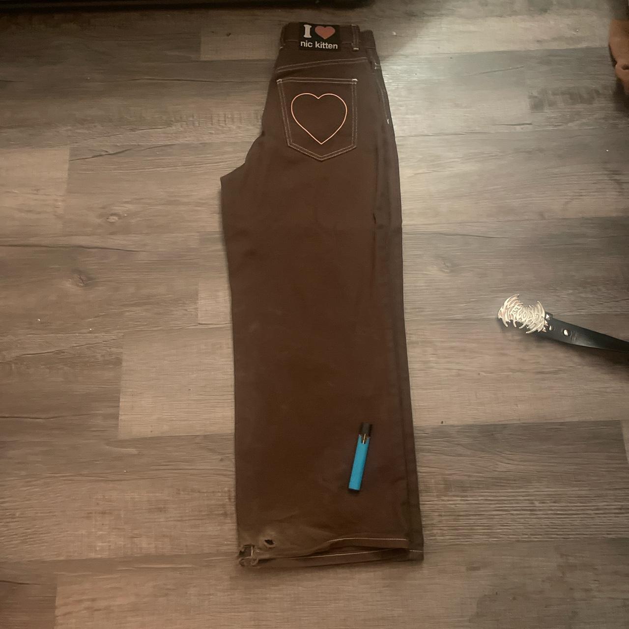 brown heart nickitten jeans first ones ever released... - Depop