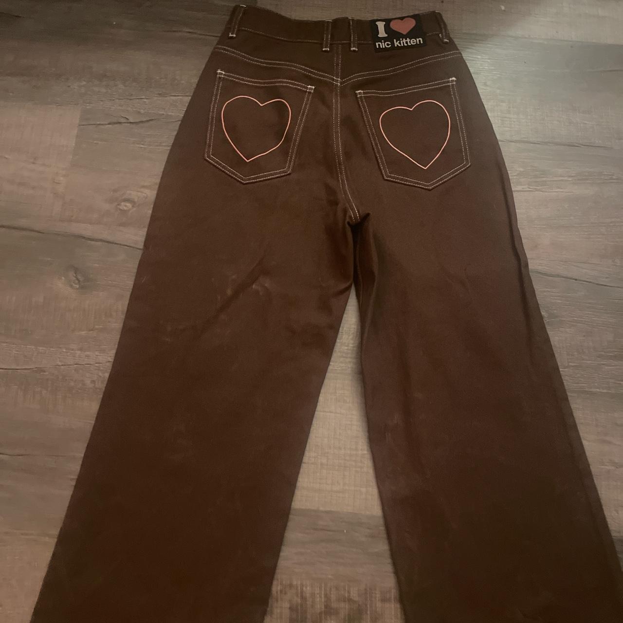 brown heart nickitten jeans first ones ever released... - Depop