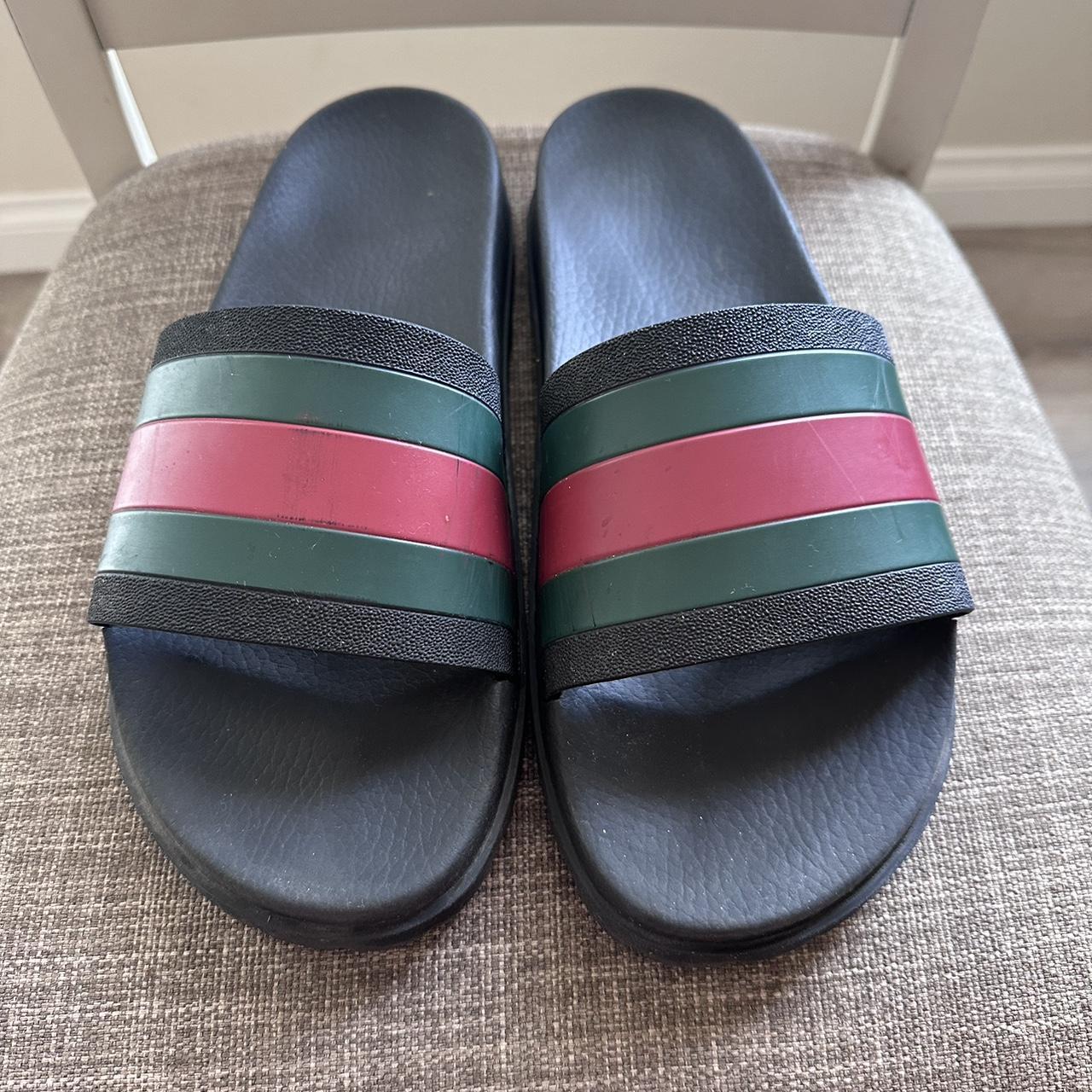 Gucci men’s rubber slides Used No box Flaws on... - Depop