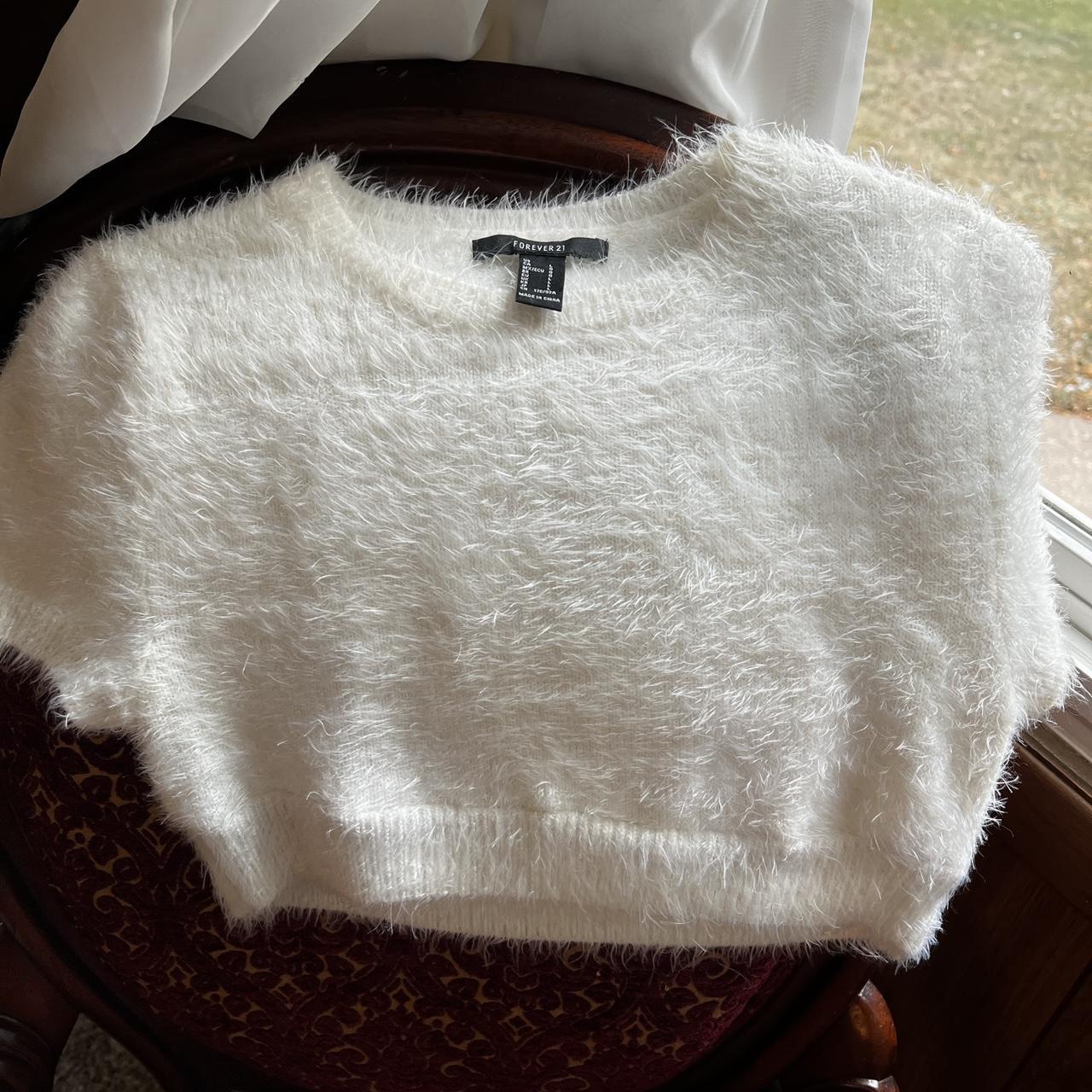 Adorable white fuzzy crop top. Fun way to spruce up... | Depop
