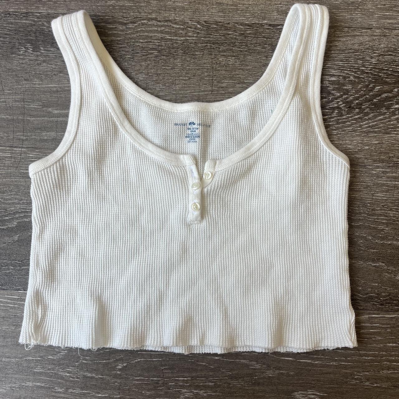 WHITE BRANDY TANK WITH CUTE BUTTONS AND NOTCHES - Depop