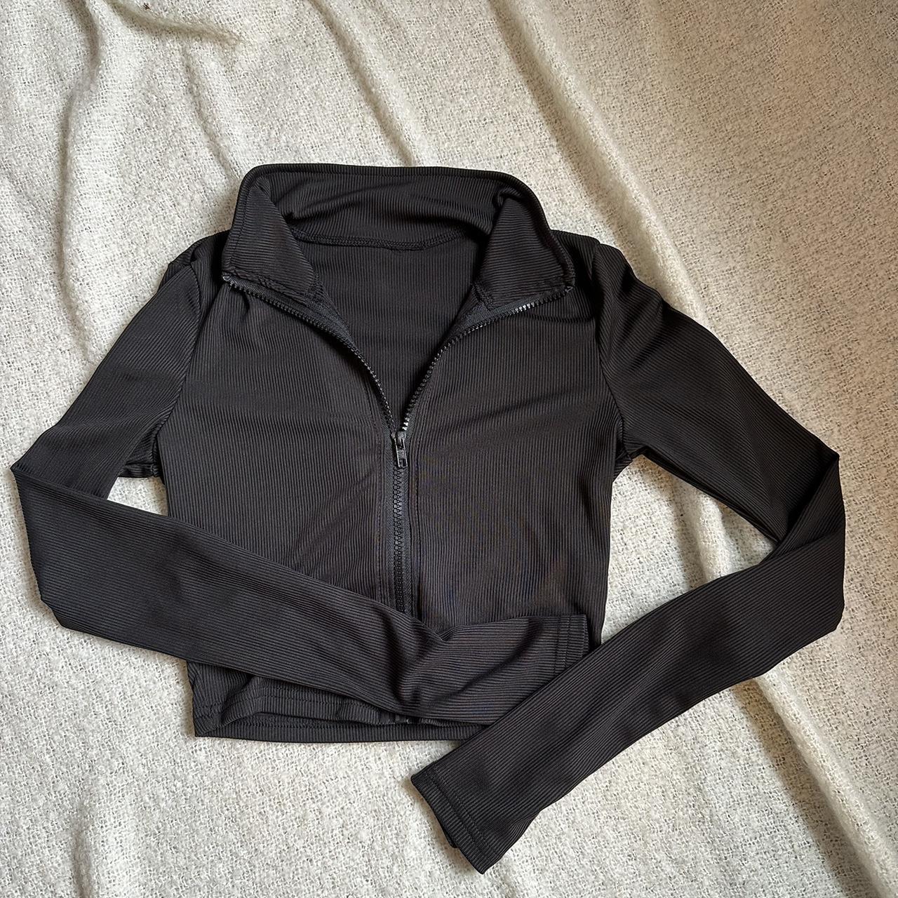 Black ribbed cropped zip up size small fits small... - Depop