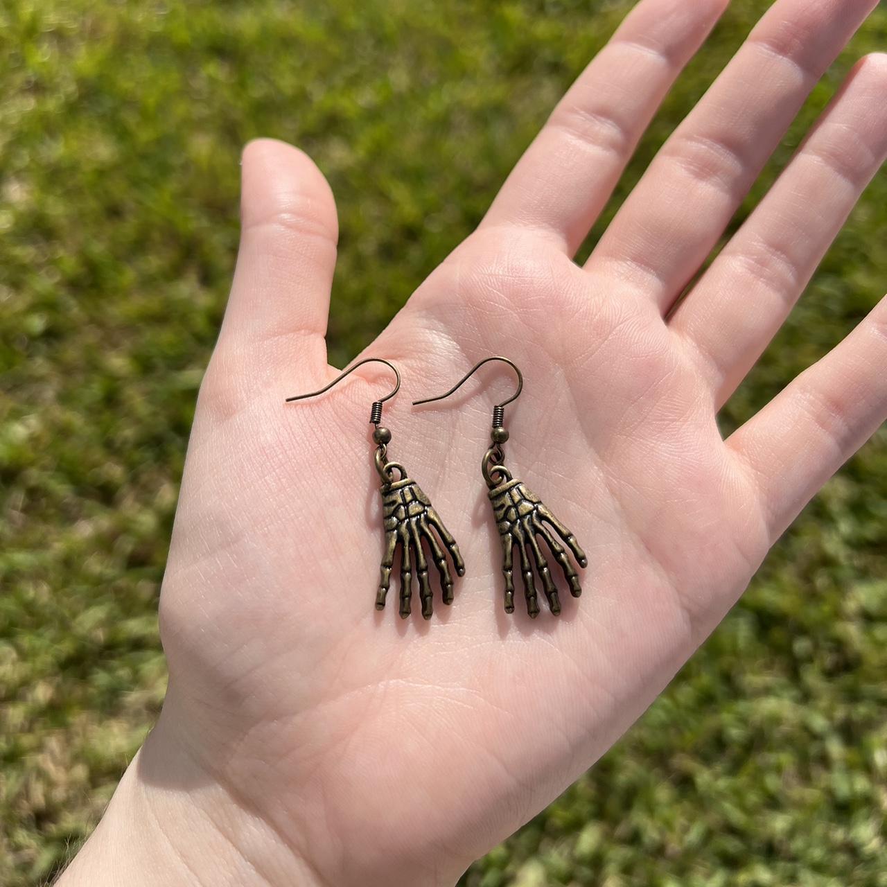 💀handmade skeleton hand earrings💀 -bronze charm on... - Depop
