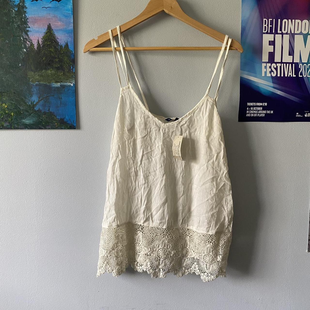 American Eagle Outfitters with label cream cami with... | Depop