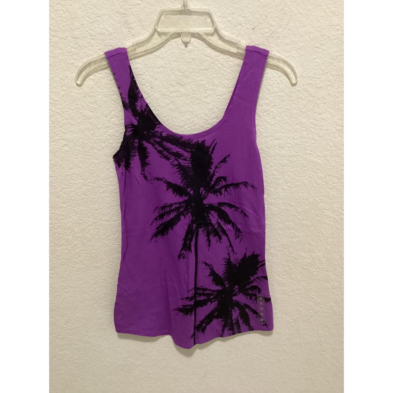 This vibrant purple tank top features a stylish... - Depop