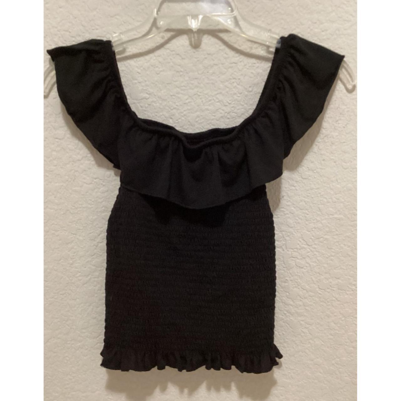 Ruffle detailing and off-shoulder design make this... | Depop