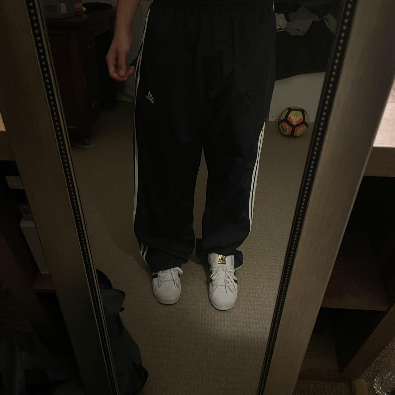 navy blue adidas track sweats. tag size L, cropped... - Depop