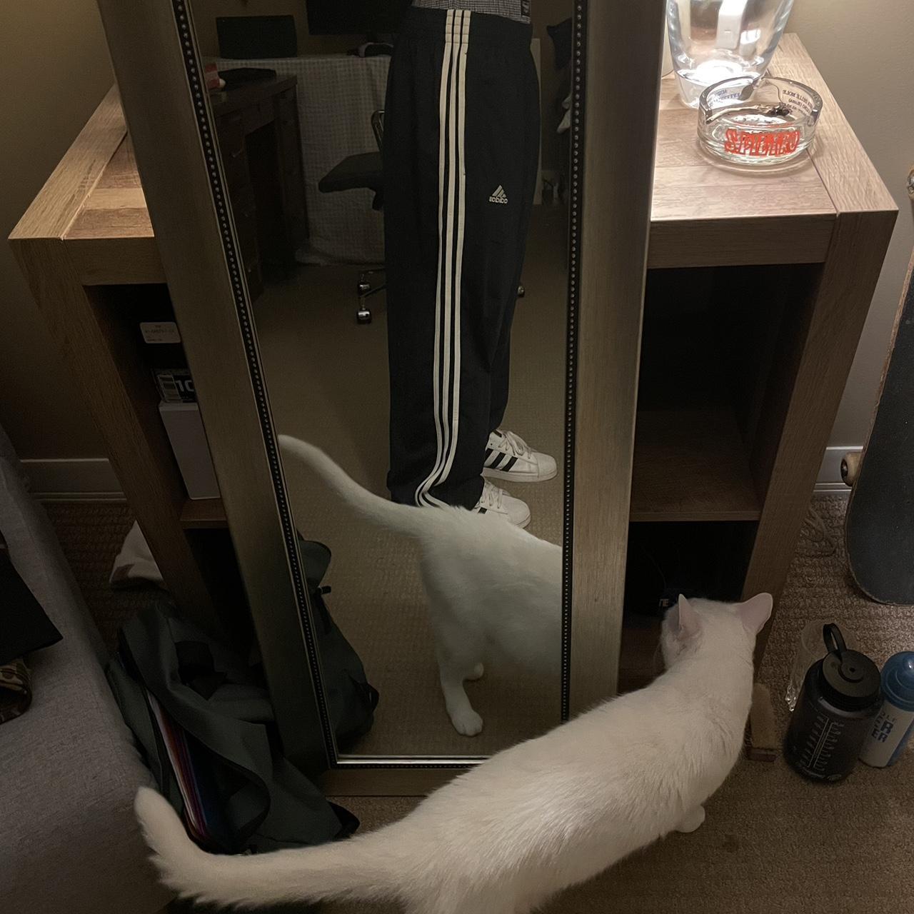 navy blue adidas track sweats. tag size L, cropped... - Depop