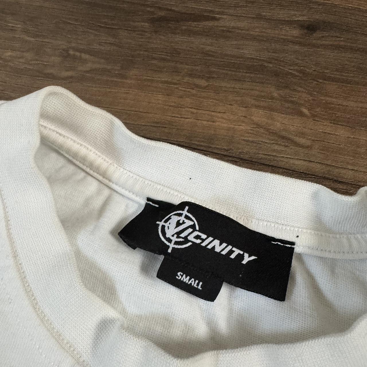 Vicinity white and black cropped t-shirt with a... - Depop