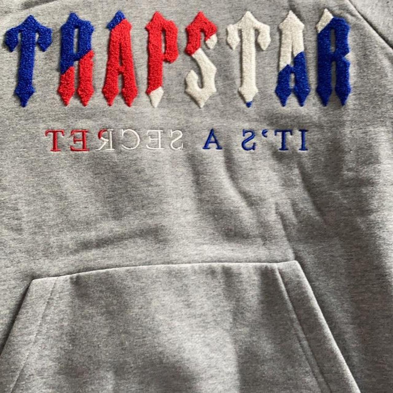 Grey trapstar tracksuit with blue, red and white... - Depop