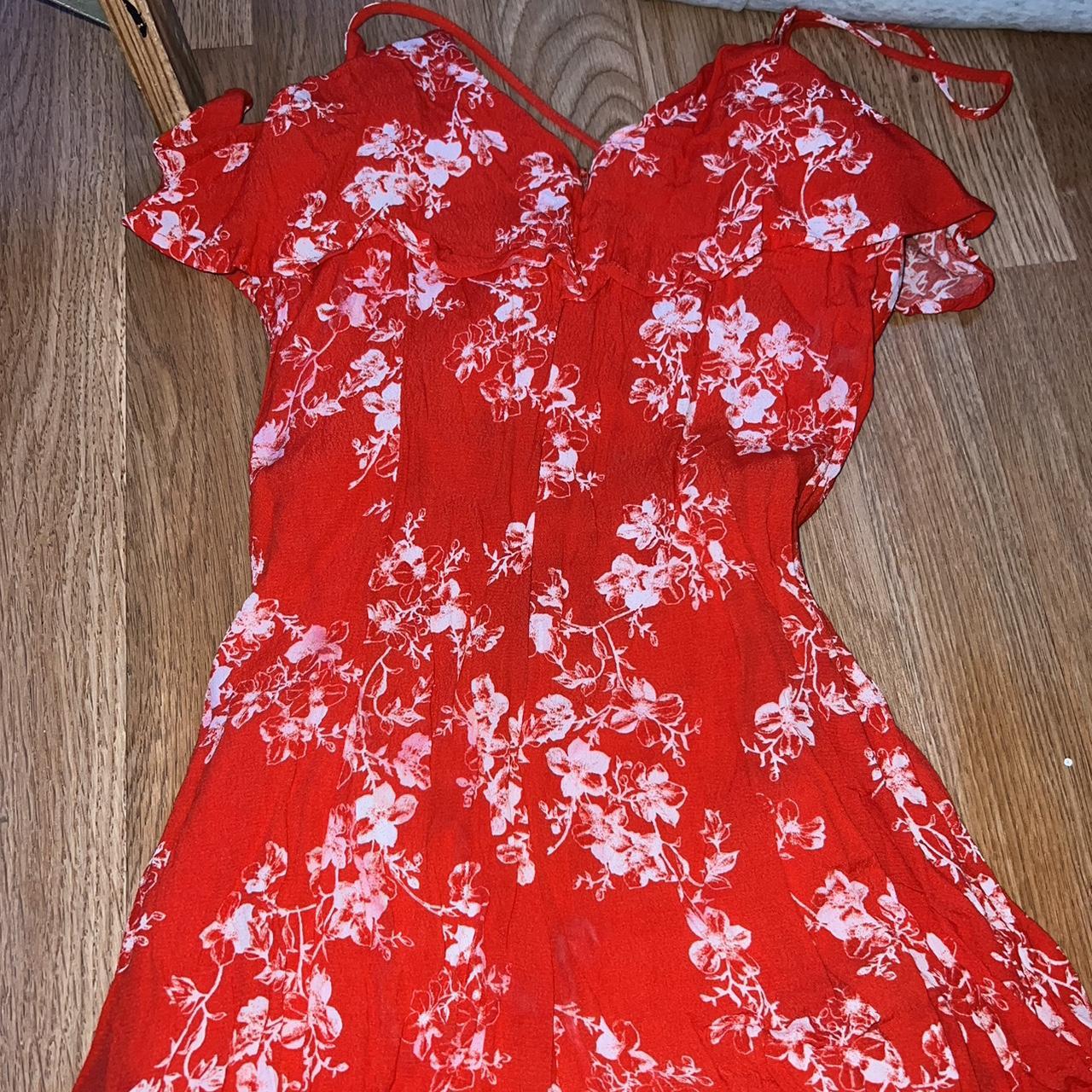 Red and white floral romper Ruffle on top Size Medium - Depop