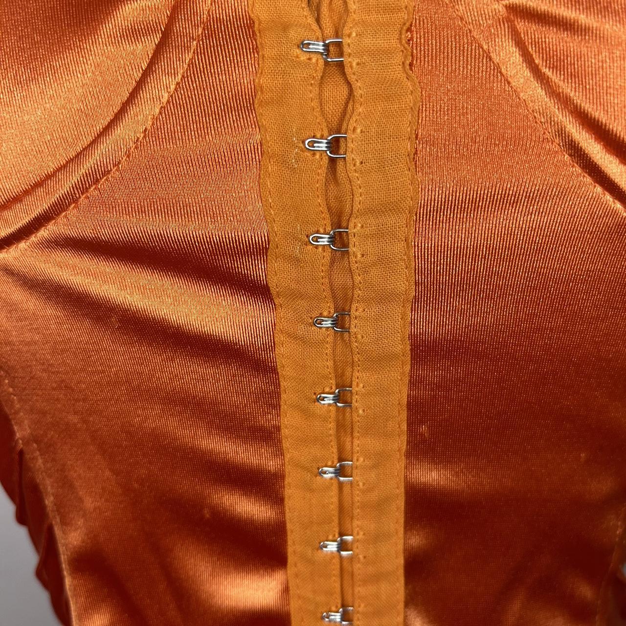 Metallic bold orange bust bodysuit, cheeky bottom... - Depop