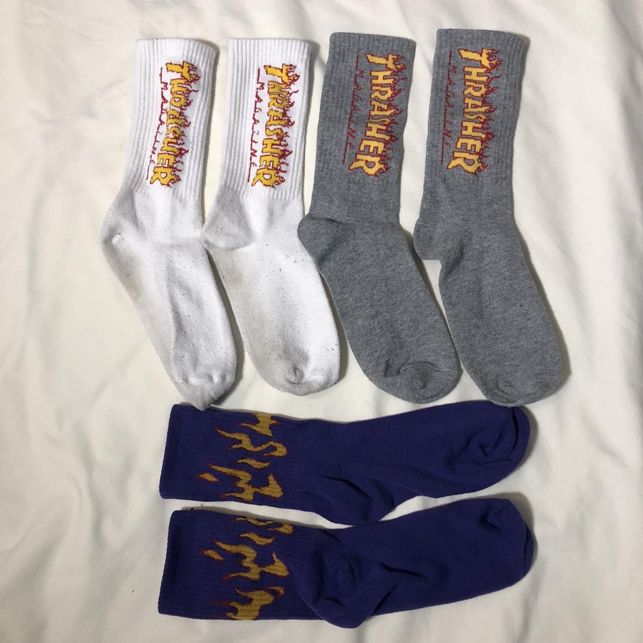 2 pairs Thrasher Magazine flame socks and 1 pair... | Depop