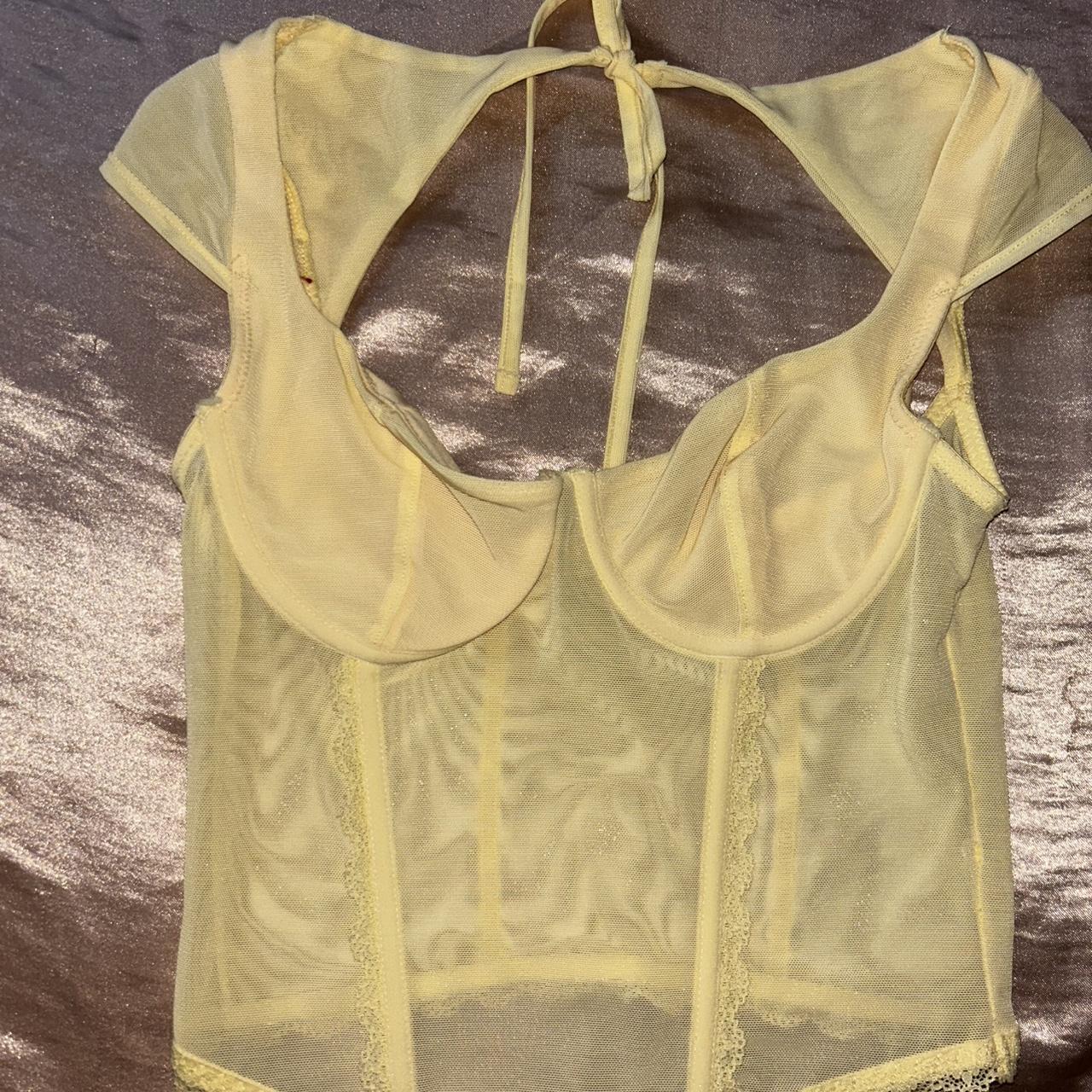 Garage Yellow corset top with lace details... | Depop