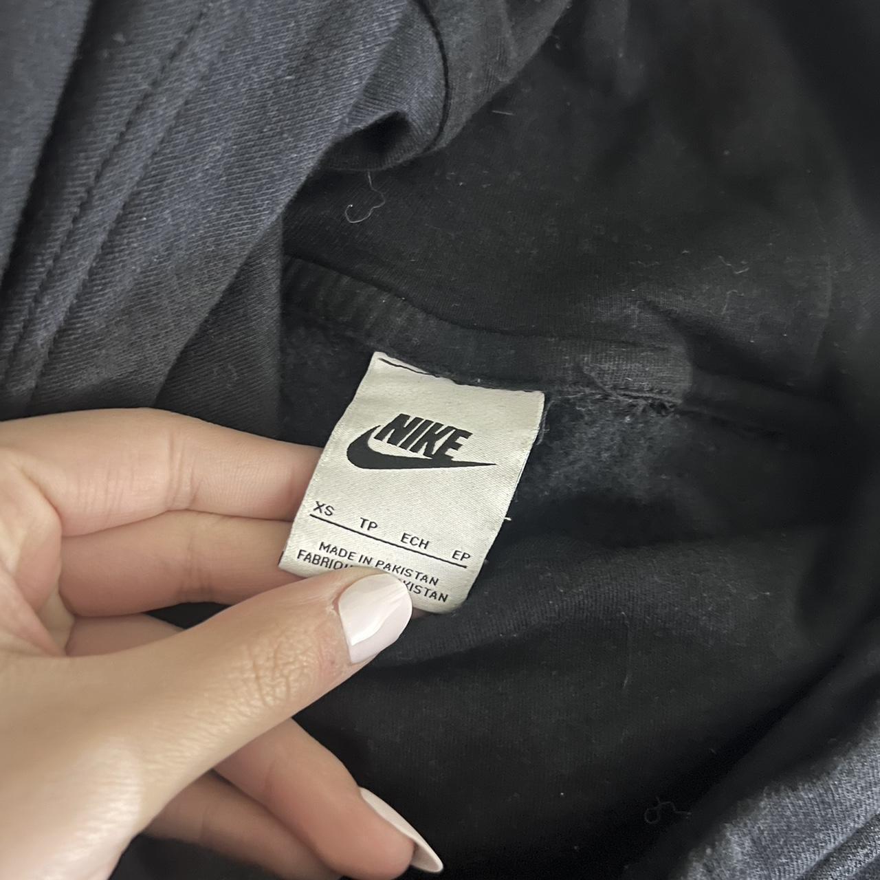 Black Nike hoodie with extra neck covering worn once... - Depop
