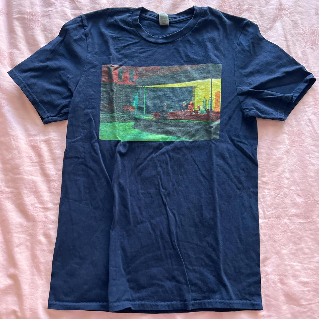Navy blue graphic tee with a screen print of... - Depop