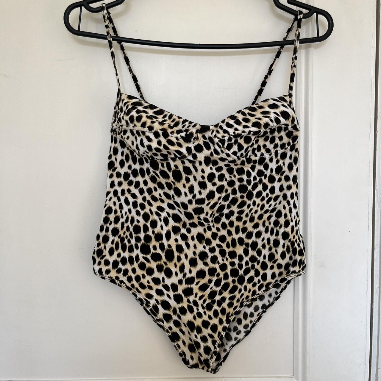 Motel rock cheetah print bodysuit size xs - Depop