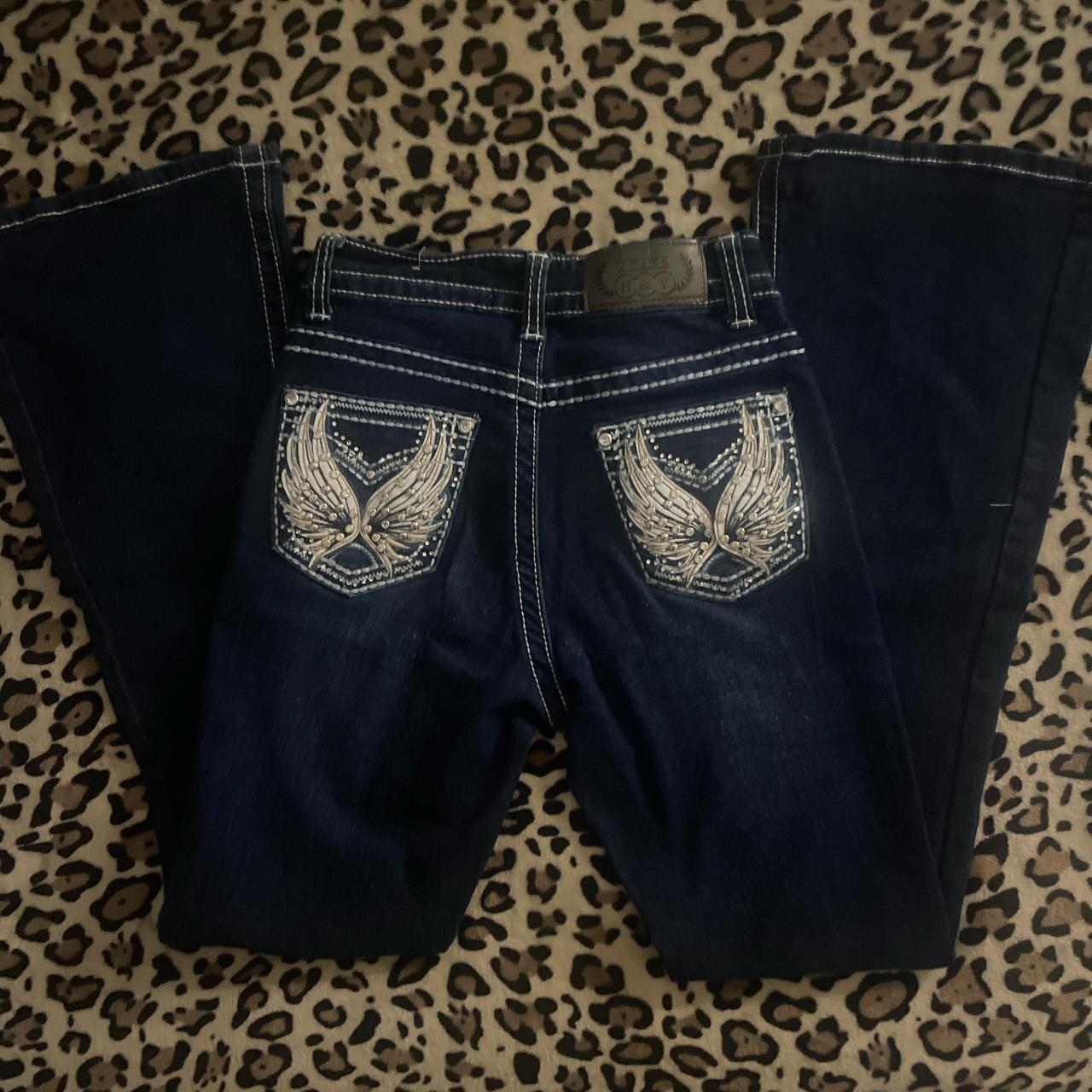 blue low rise rhinestone flare jeans with white... | Depop
