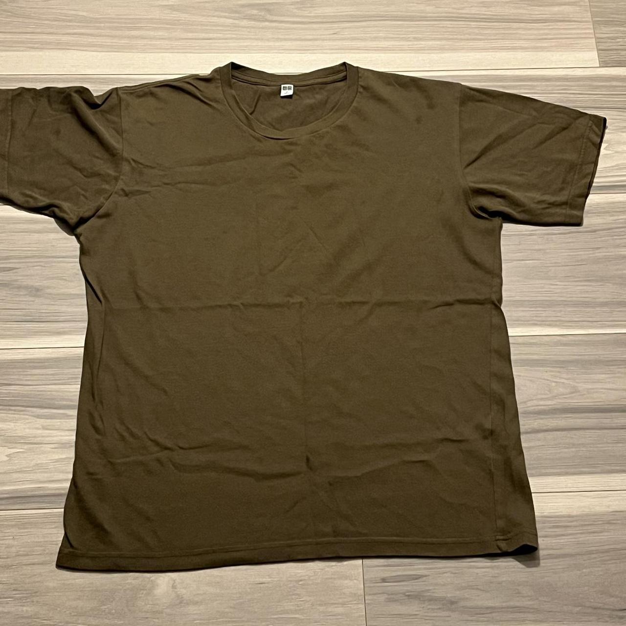 oversized army green uniqlo tshirt has a view... - Depop