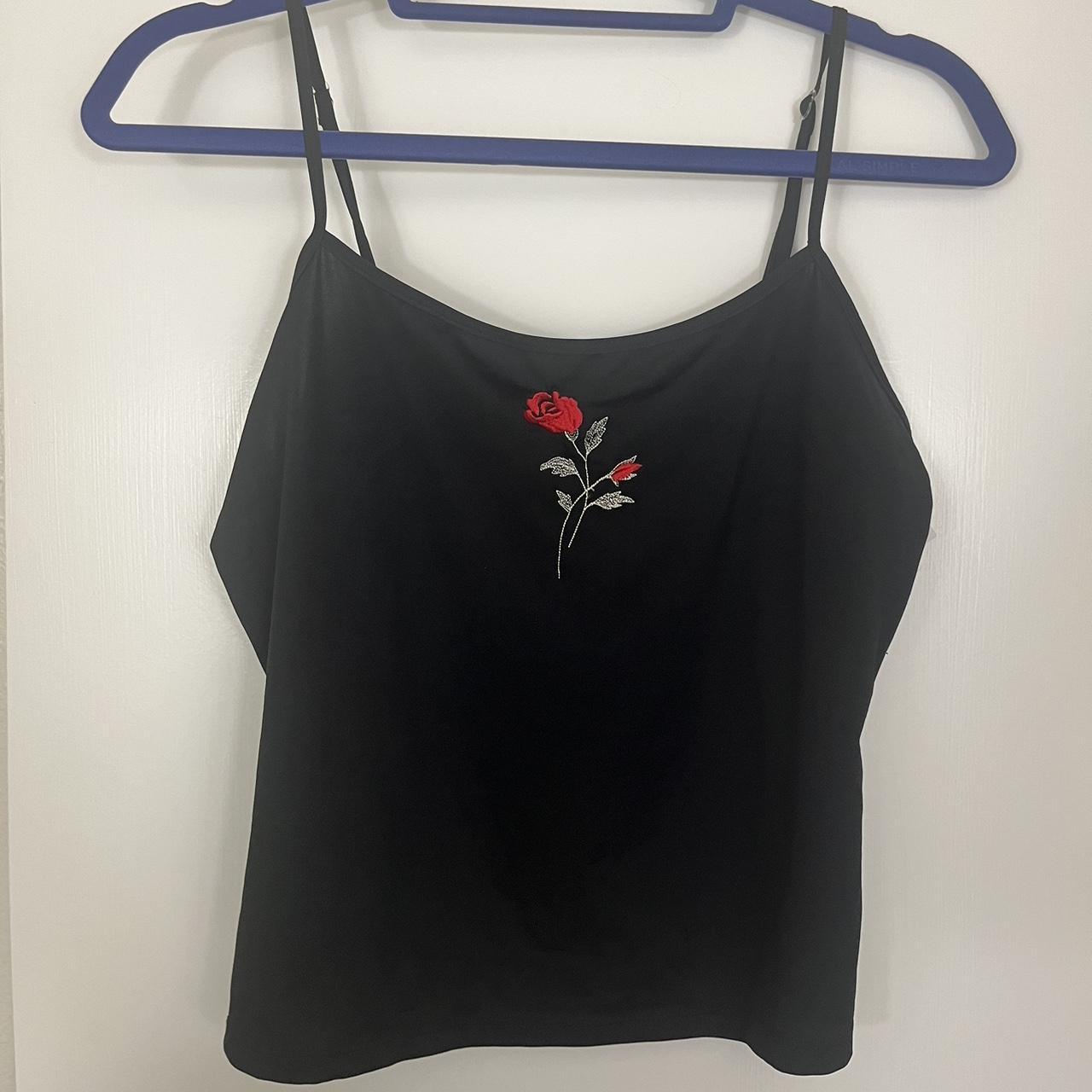 cropped, black spaghetti strap top with a pretty... - Depop